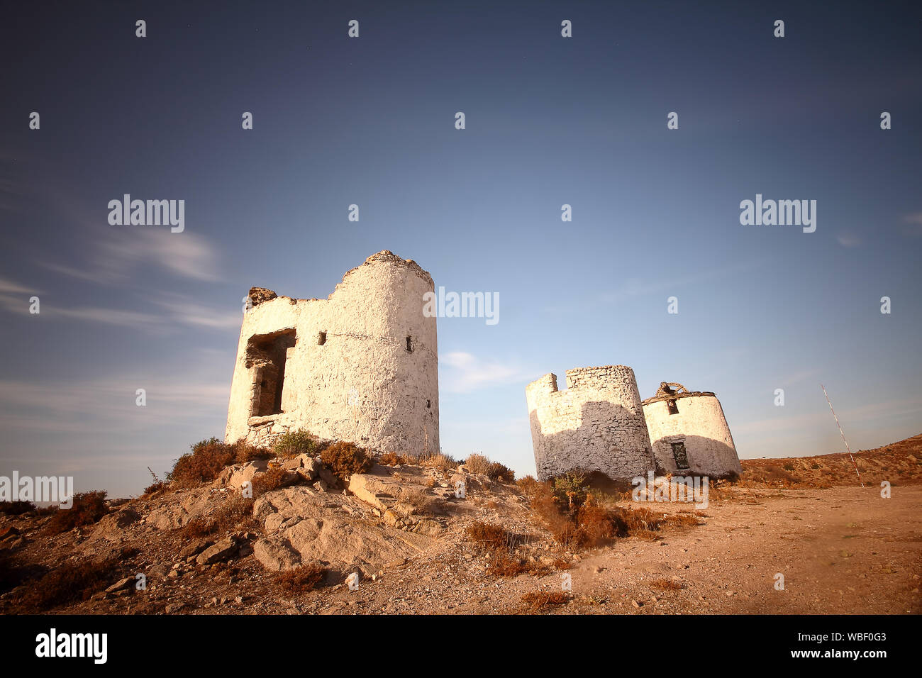 A wide angle shot from the base of an abandoned windmill Stock Photo ...