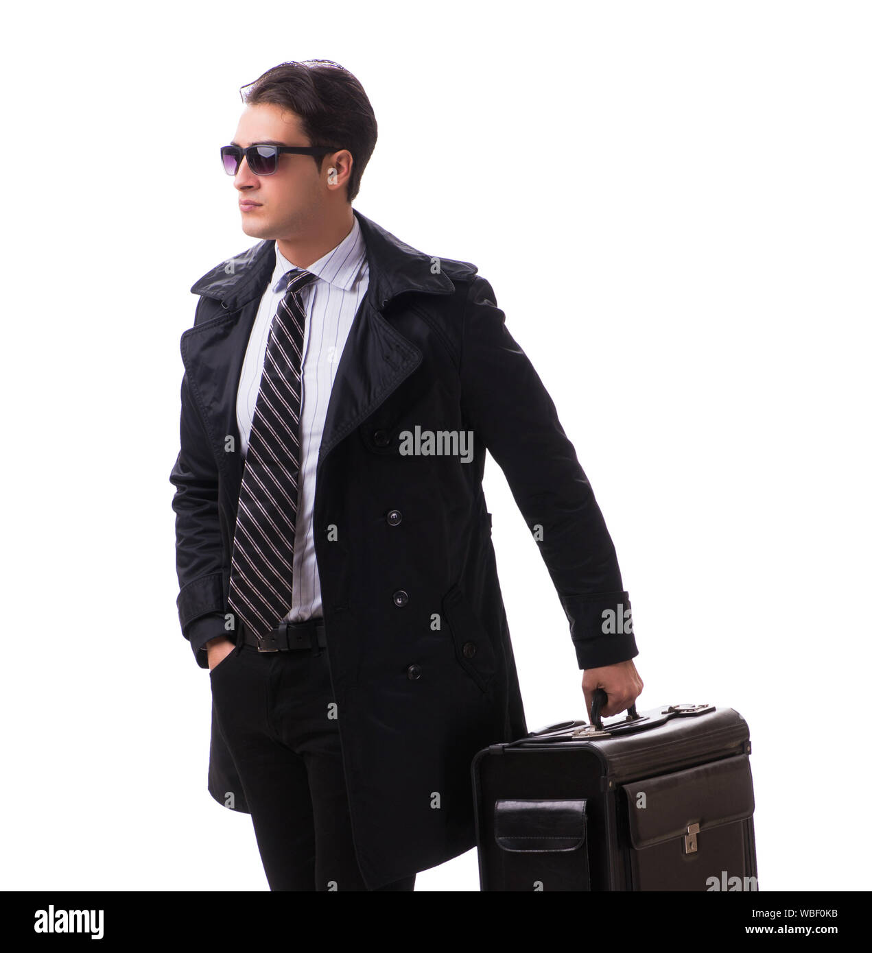 The young businessman with suitcase ready for business trip on white ...