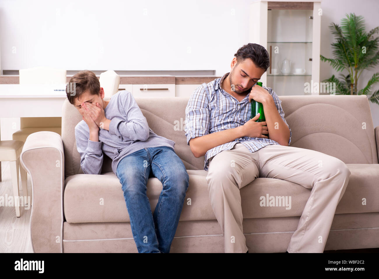 The drunk father and his son Stock Photo - Alamy