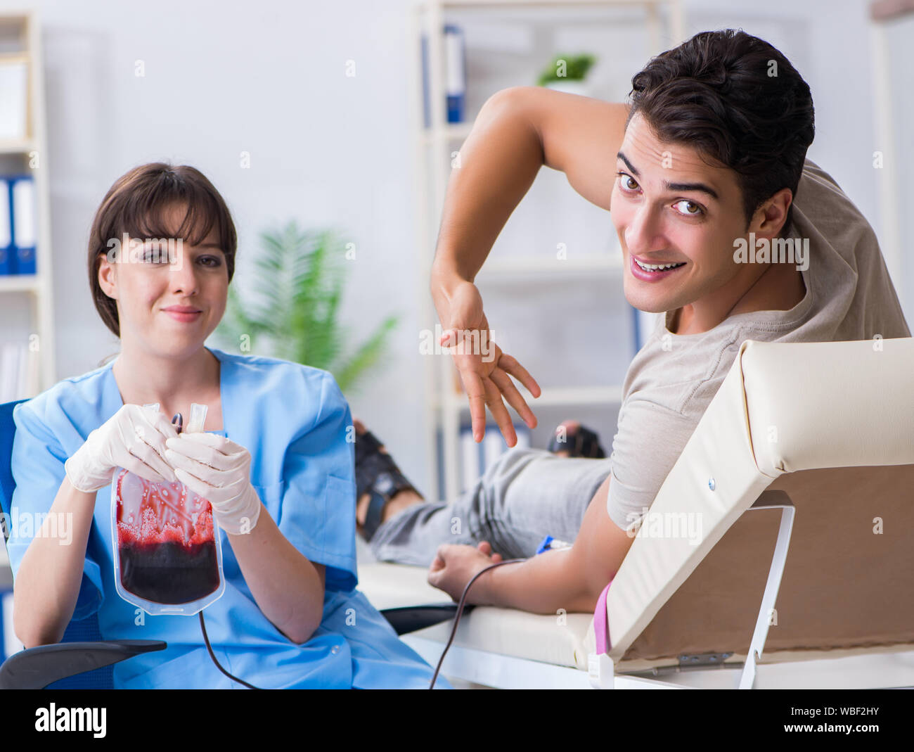 The patient getting blood transfusion in hospital clinic Stock Photo ...
