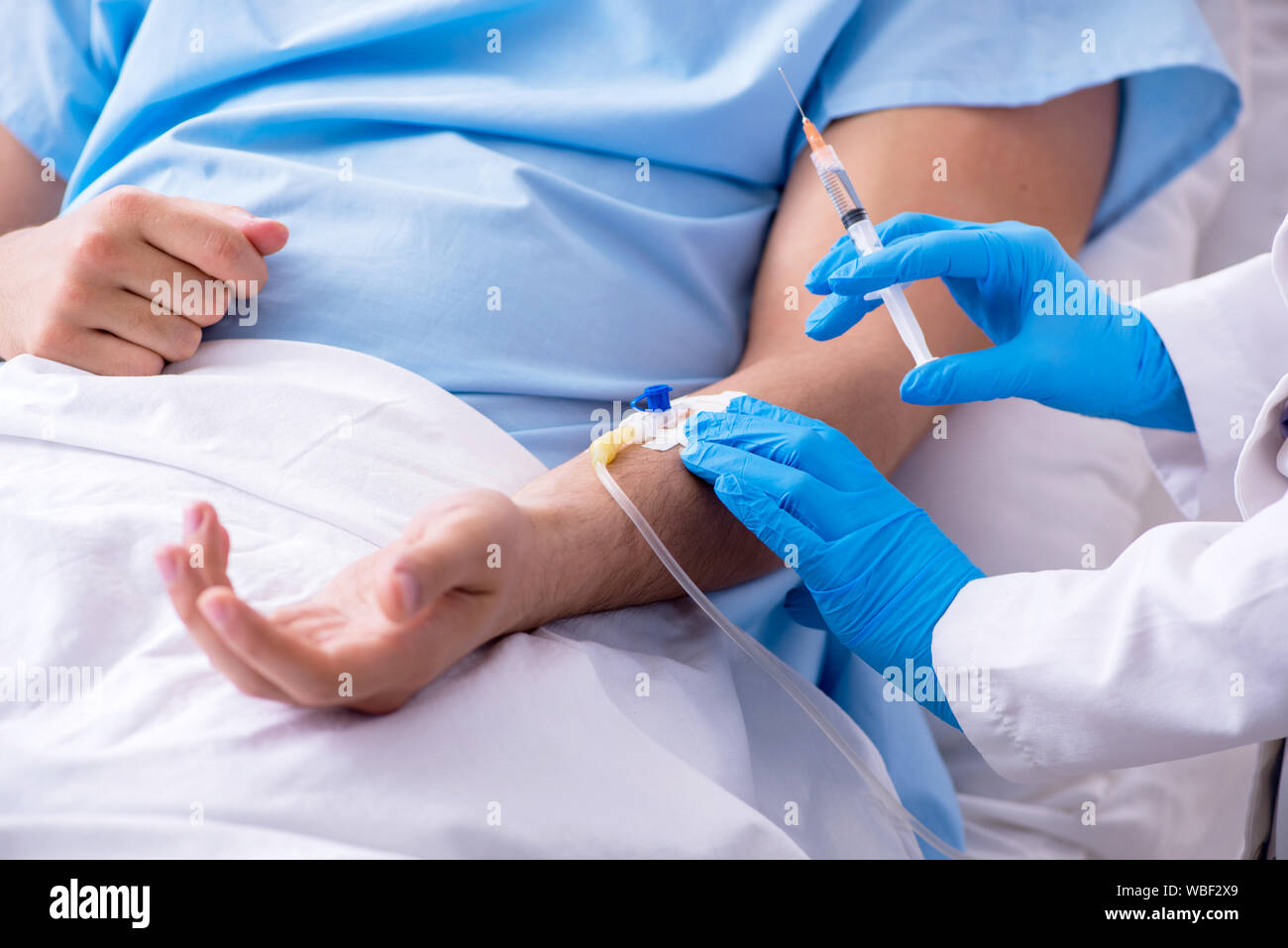 The male patient in blood transfusion concept Stock Photo - Alamy