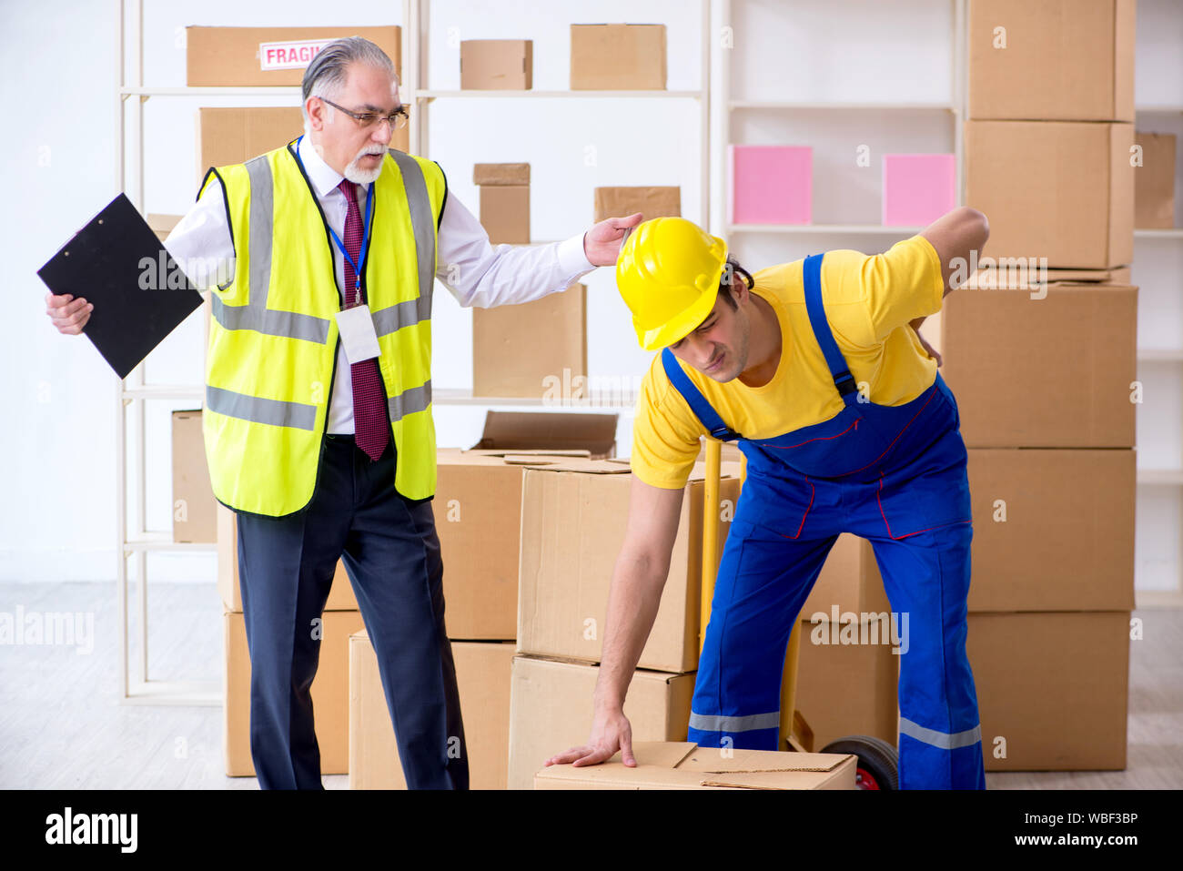 The professional movers doing home relocation Stock Photo - Alamy