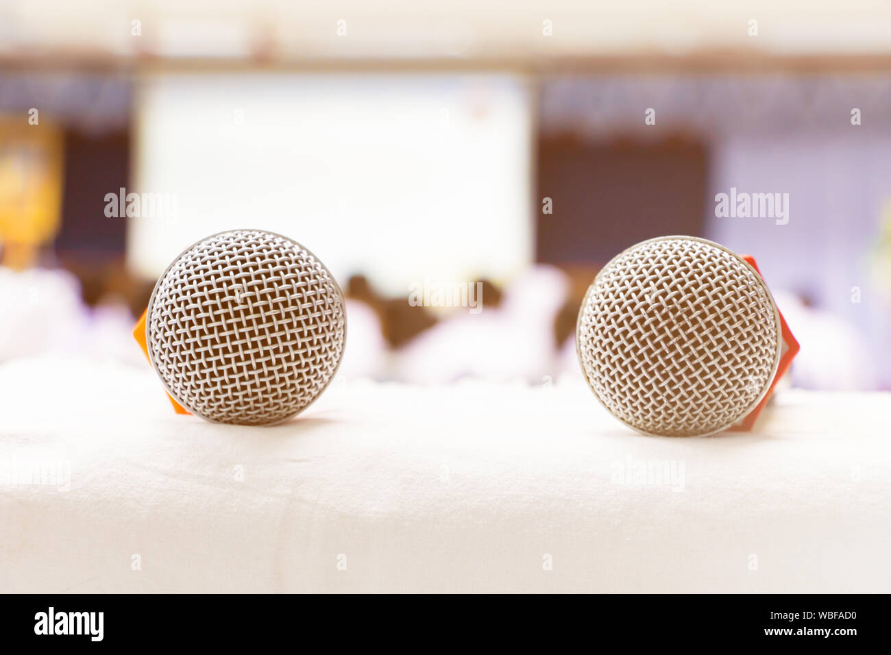 Close up old microphone wireless two on the white table in business ...