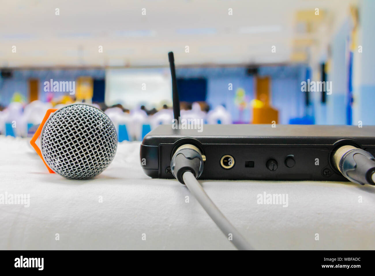 Close up old microphone wireless with box signal on the white table in ...
