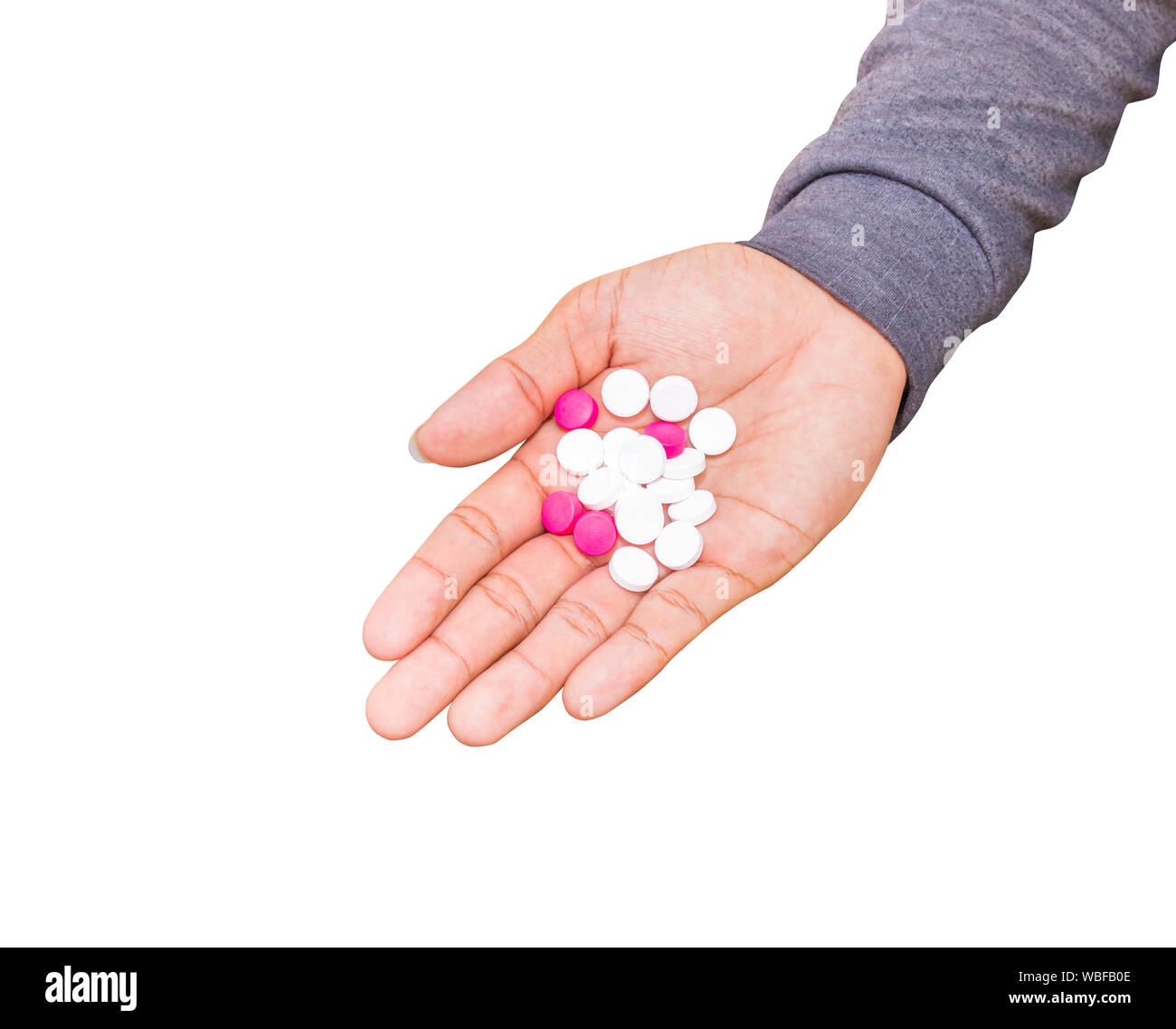 pills in hand male isolated on white background and clipping path. Stop ...