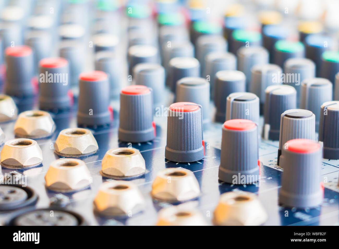 Close up Volume adjusting knobs on audio mixer controller in control ...