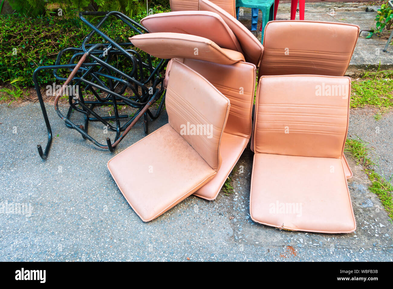 office chair leather brown old damage dirty heap on the floor road ...