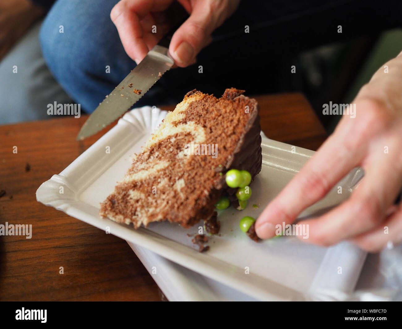 Man eating chocolate cake hi-res stock photography and images - Alamy