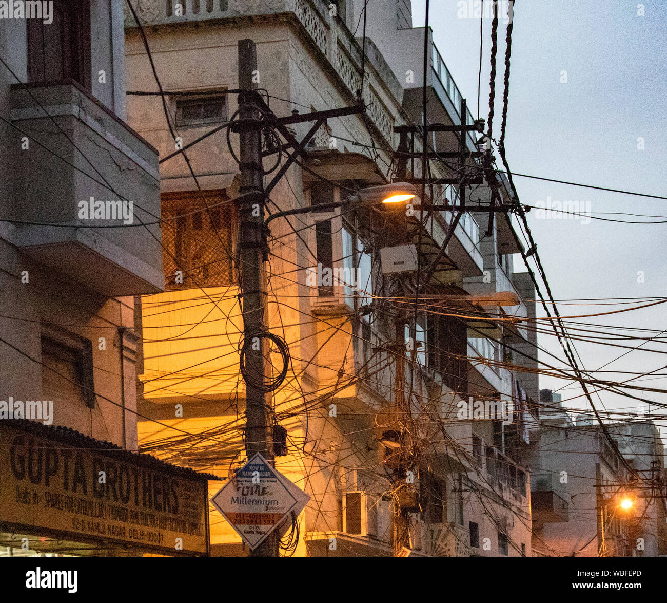 New Delhi, India, Feb 19, 2018 - Overhead cables create a rats maze ...