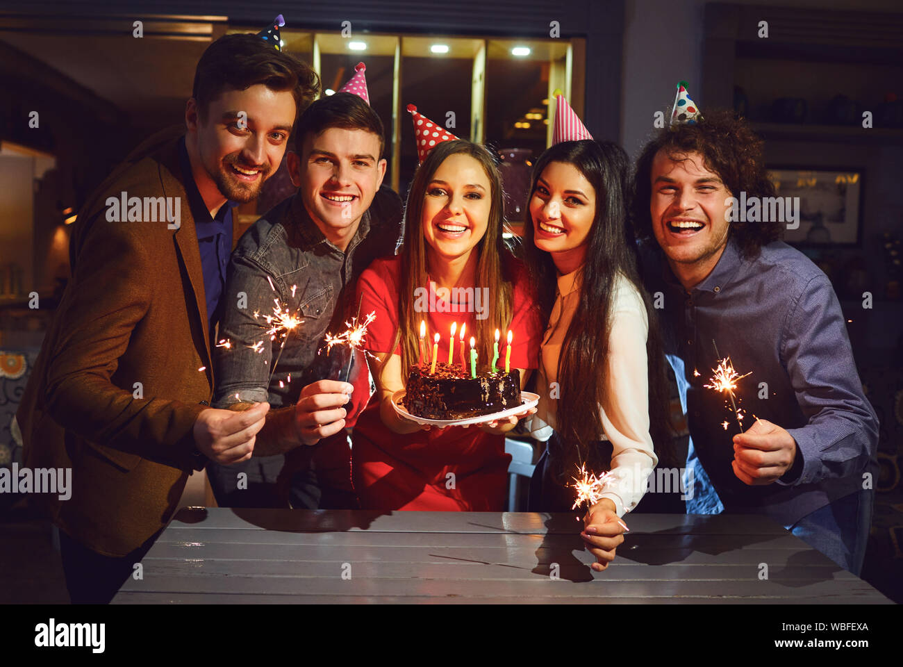 Friends at a birthday party Stock Photo - Alamy