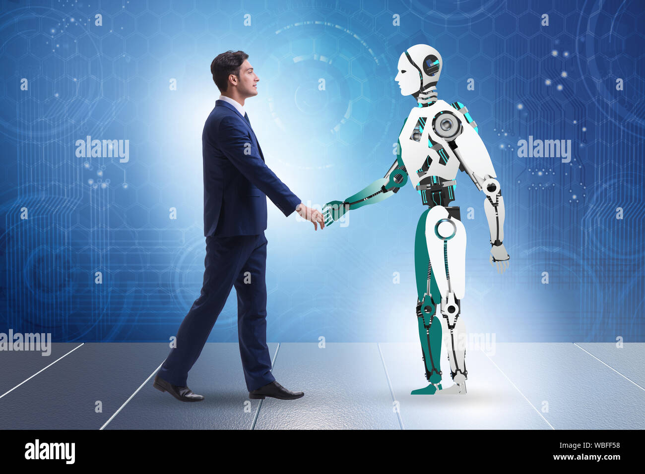The concept of cooperation between humans and robots Stock Photo - Alamy