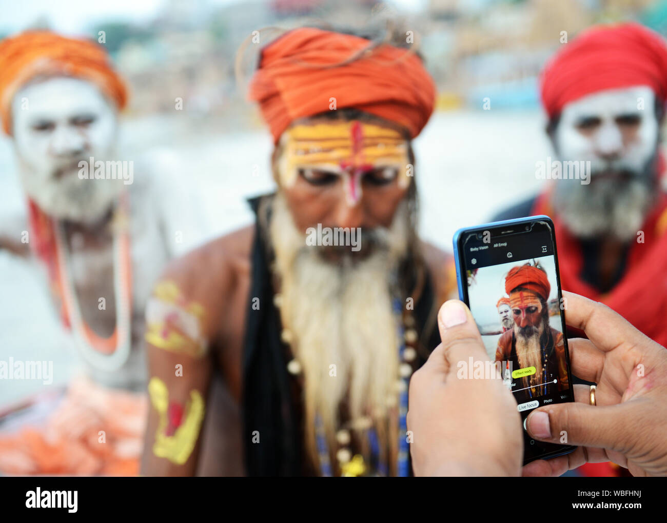 Shaiva sadhus in On the Ganges in Varanasi Stock Photo - Alamy