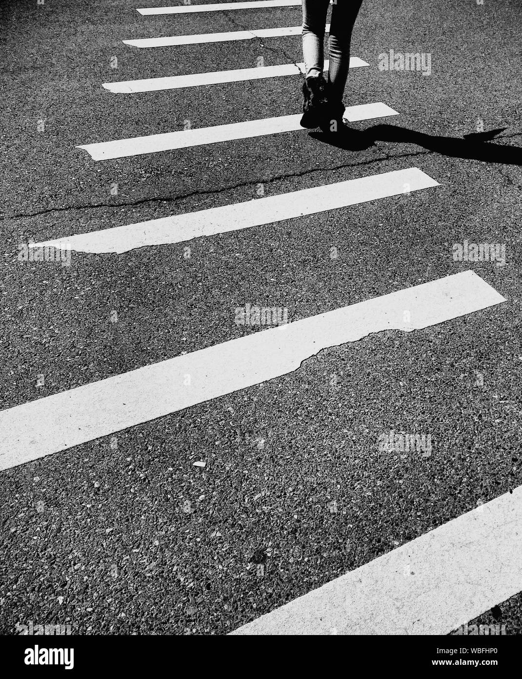 Walking on crosswalk hi-res stock photography and images - Alamy