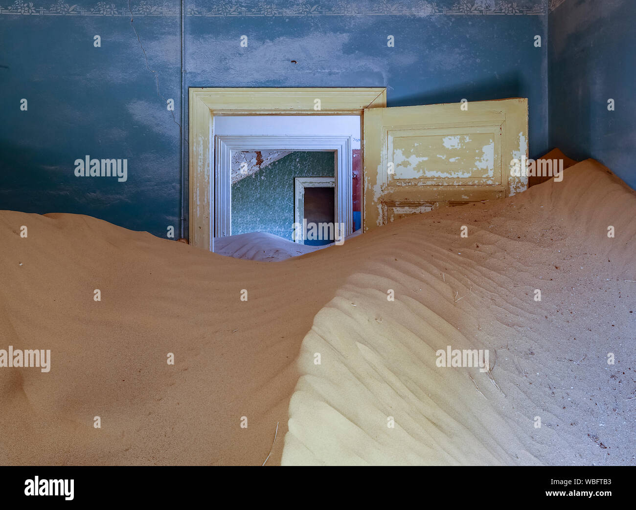 Sand has invaded and taken over these rooms in Kolmanskoppe, Namibia ...