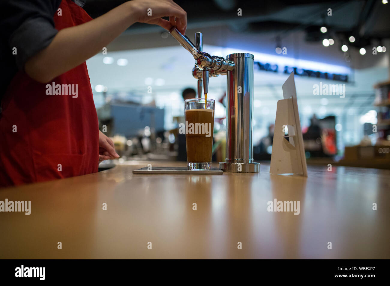 Female coffee maker hi-res stock photography and images - Alamy