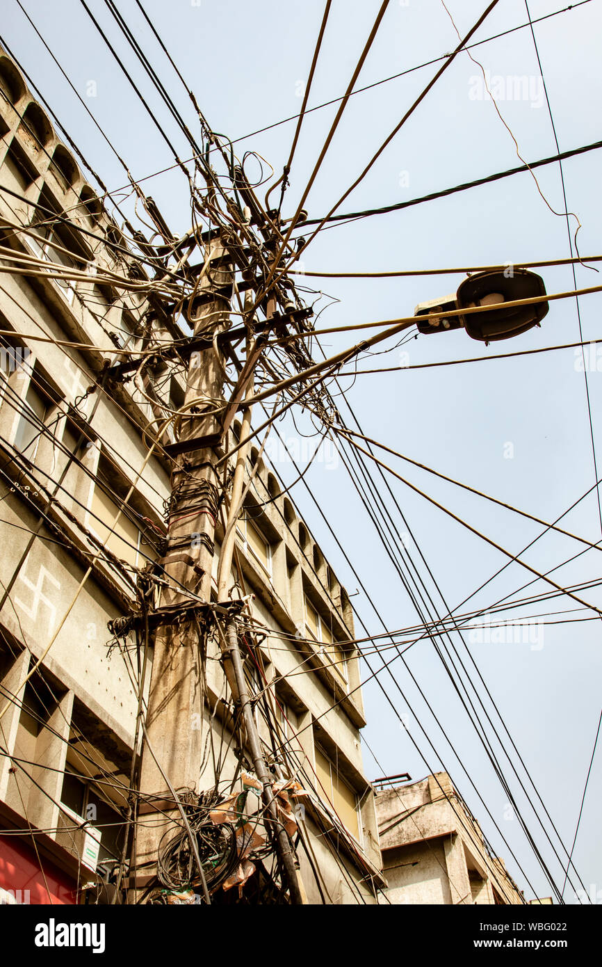 New Delhi, India, Feb 19, 2018 - Overhead cables create a rats maze ...