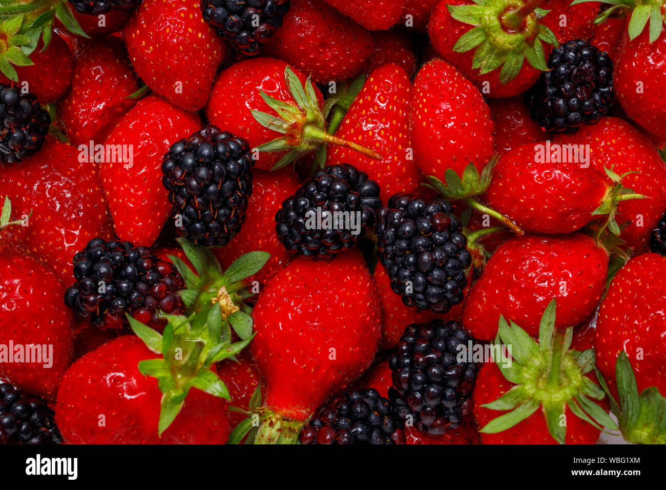 Berry mix with strawberry and raspberry Stock Photo - Alamy