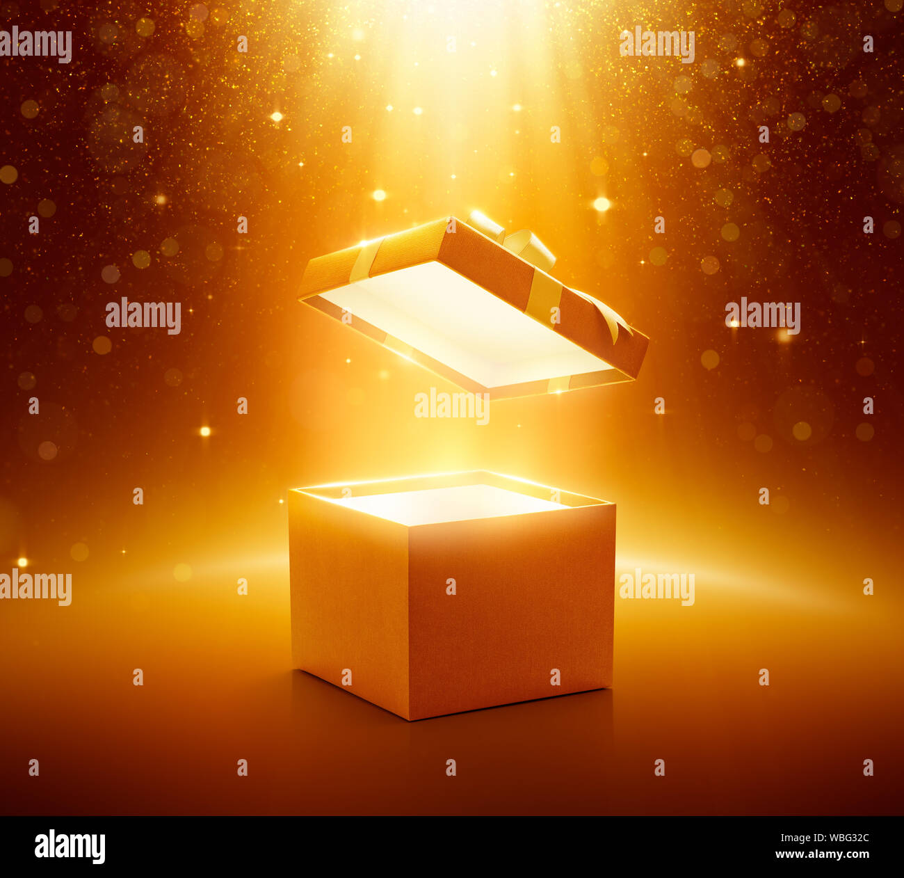 Gold open gift box on glittering background Stock Photo - Alamy