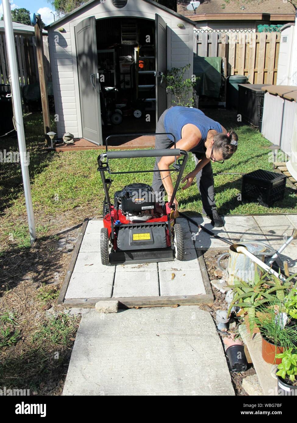 Working in the yard hi-res stock photography and images - Alamy