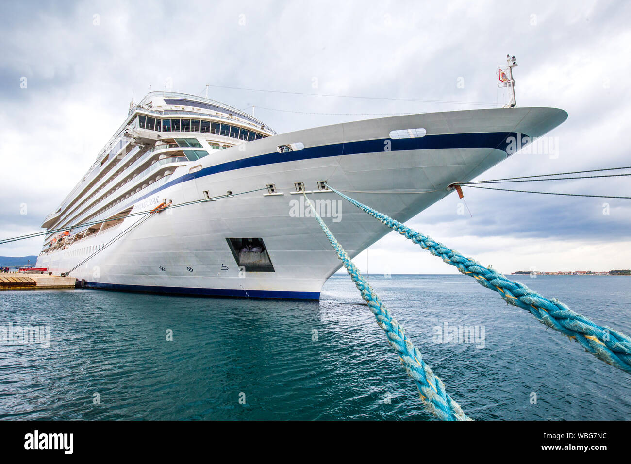 09 May 2019. Cruise ship docked with the mooring lines attached to the ...