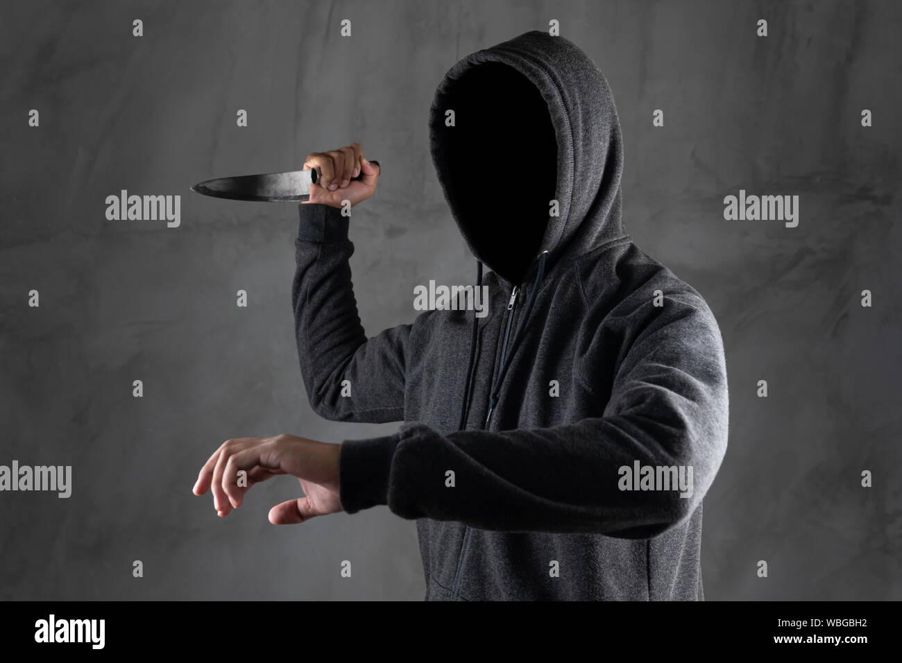 Man Standing With Knife