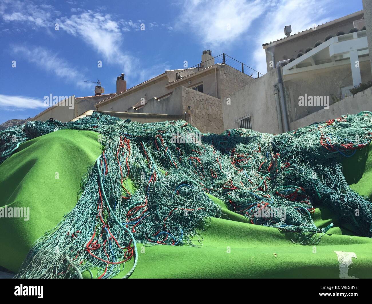 Fishing Nets On Green Fabric Stock Photo - Alamy