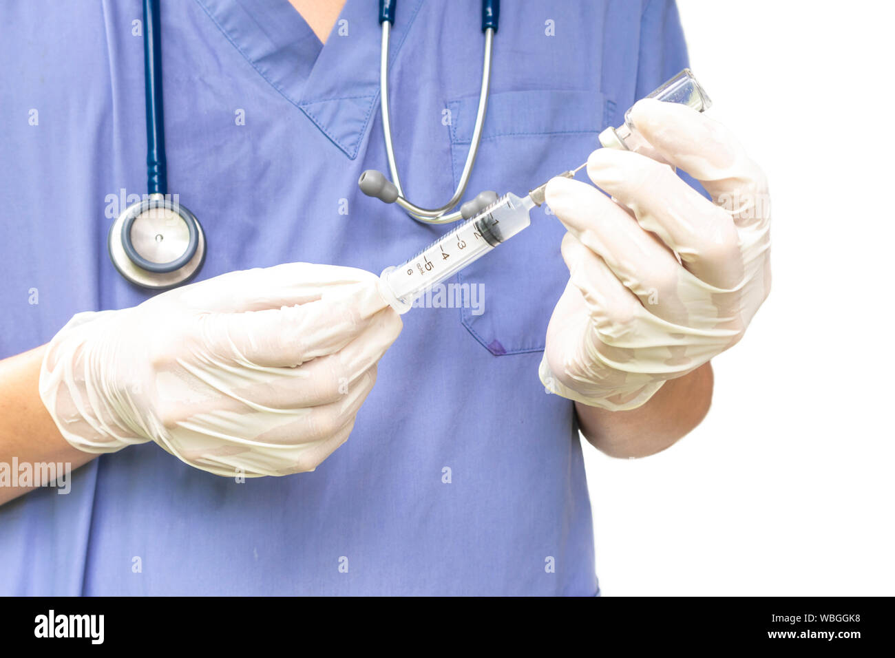 Doctor hand holding vials medication and injection needle. Medical ...