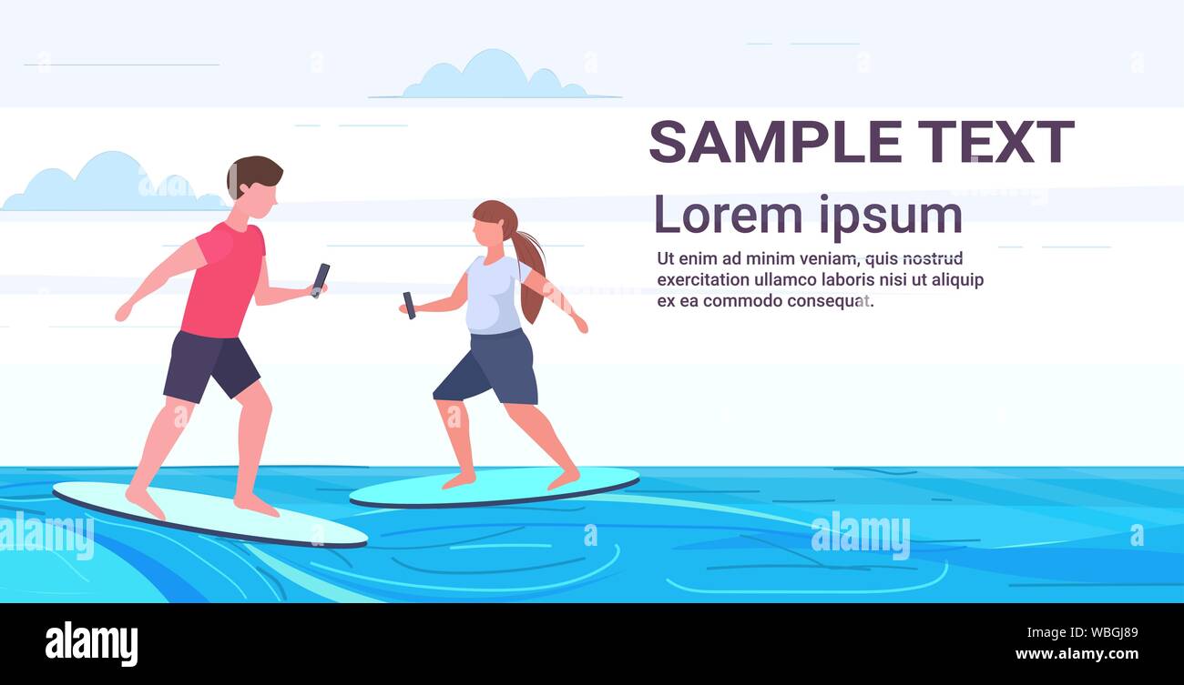 man woman surfers holding cellphones surfing on wave couple using ...