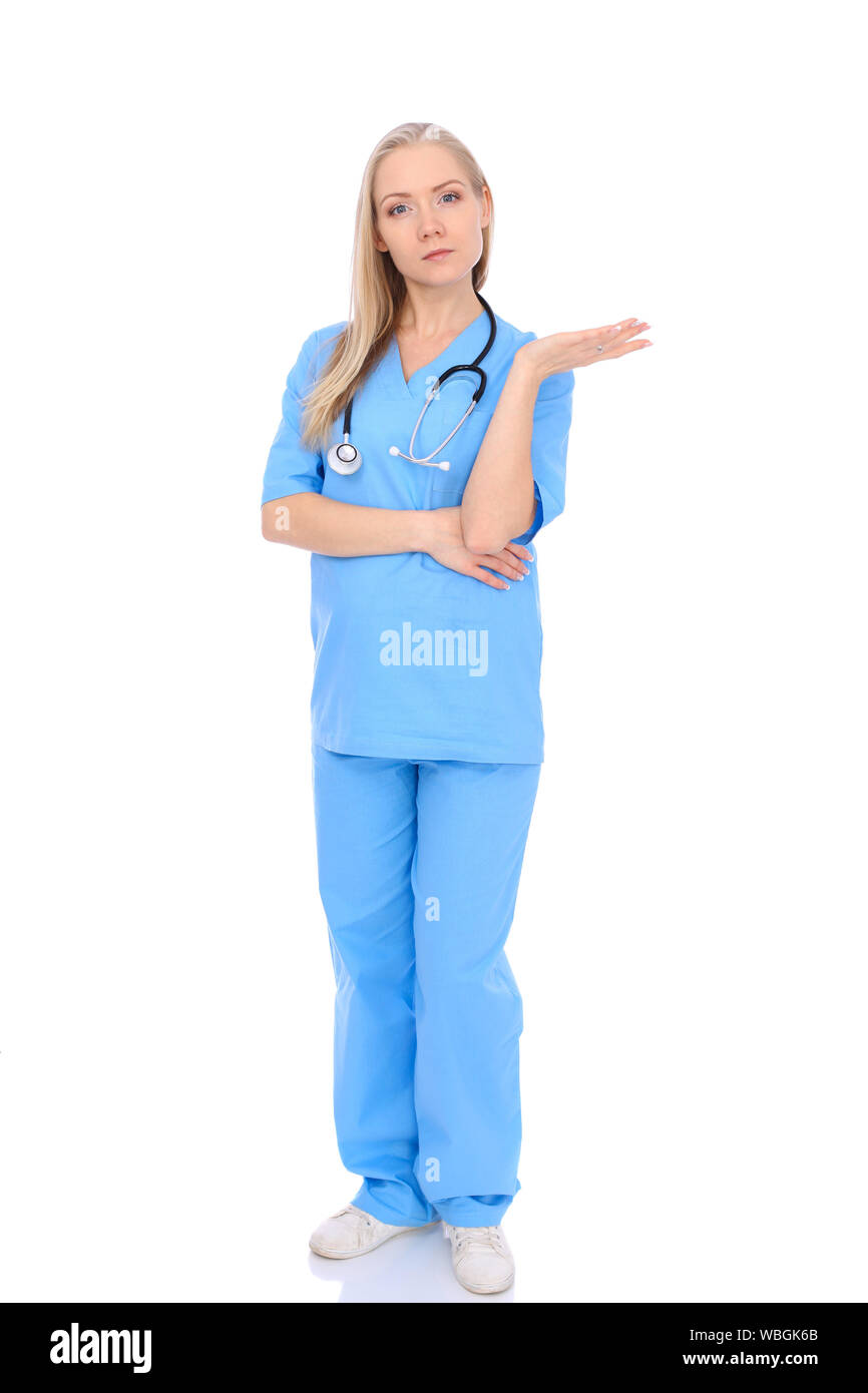 Doctor woman or nurse isolated over white background. Cheerful smiling ...