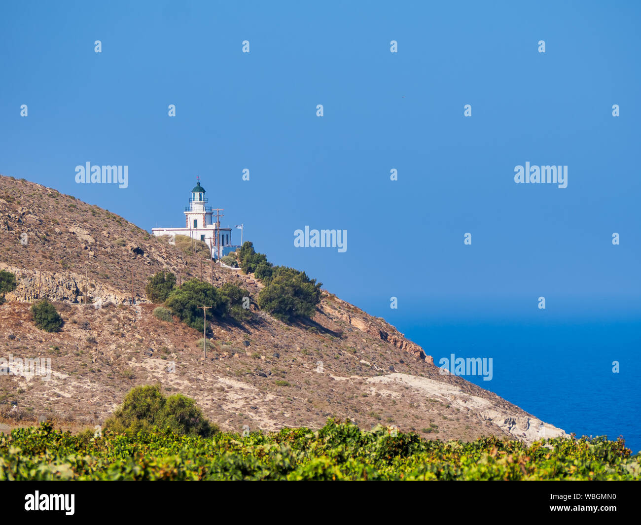 Akrotiri Lighthouse (Faros) with clear sky - Santorini Greece Stock ...