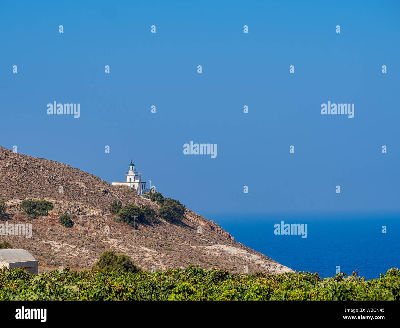 Akrotiri Lighthouse (Faros) with clear sky - Santorini Greece Stock ...