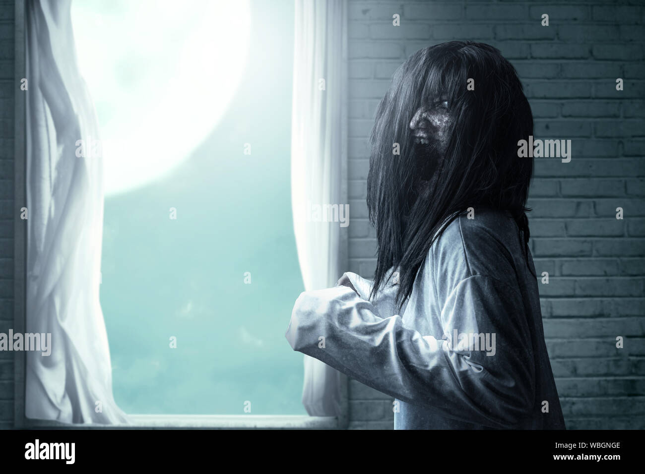 A scary ghost woman with blood and an angry face haunted the abandoned ...