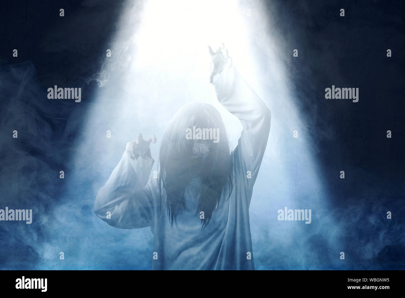 Scary ghost woman with blood and angry face with clawing hands standing ...