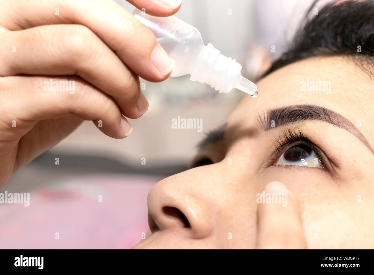 Applying drops hi-res stock photography and images - Alamy