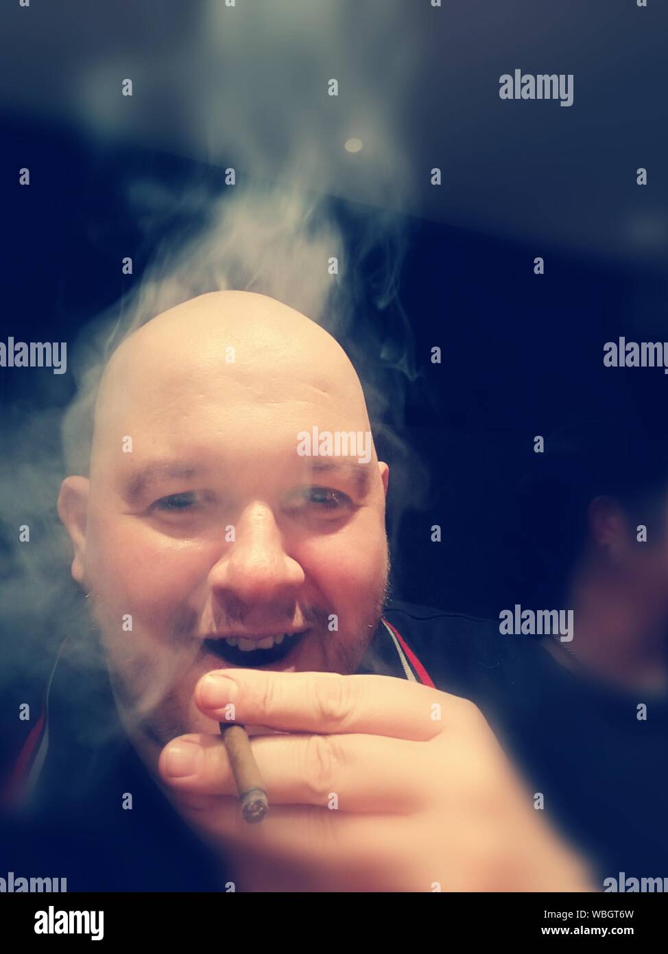 Smoking cigar face hi-res stock photography and images - Alamy