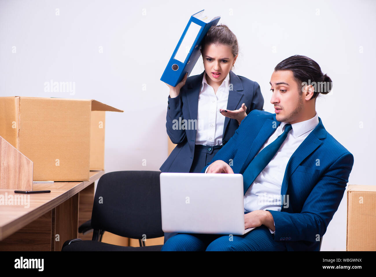 The two employees being fired from their work Stock Photo - Alamy