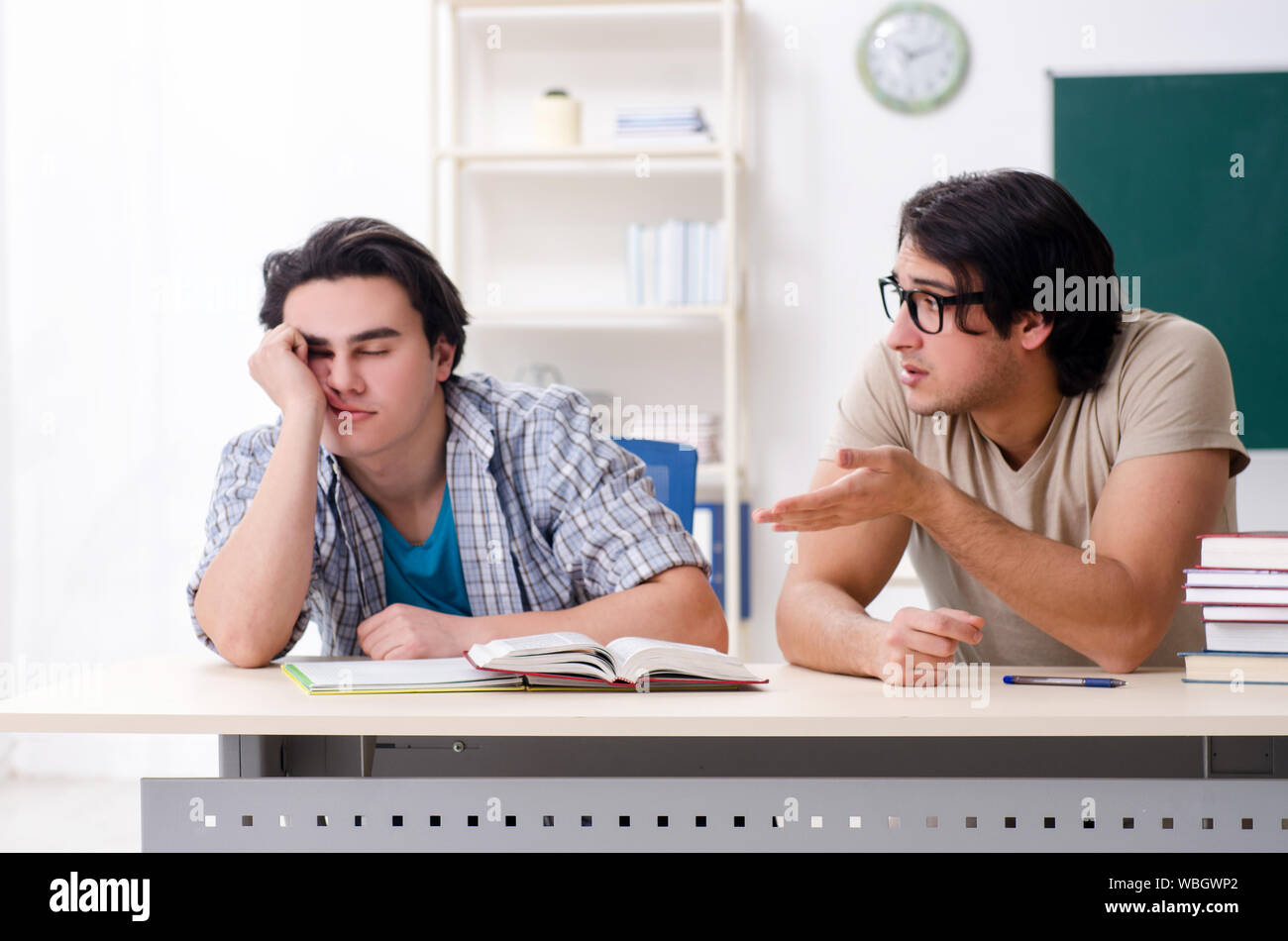 The two male students in the classroom Stock Photo - Alamy