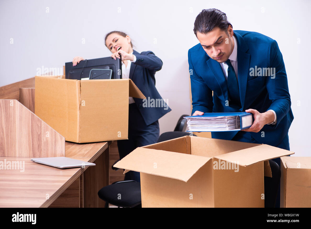 The two employees being fired from their work Stock Photo - Alamy
