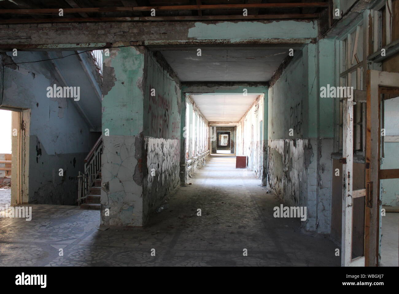21 August 2019, Russia, Beslan: In the ruins of the old school of ...