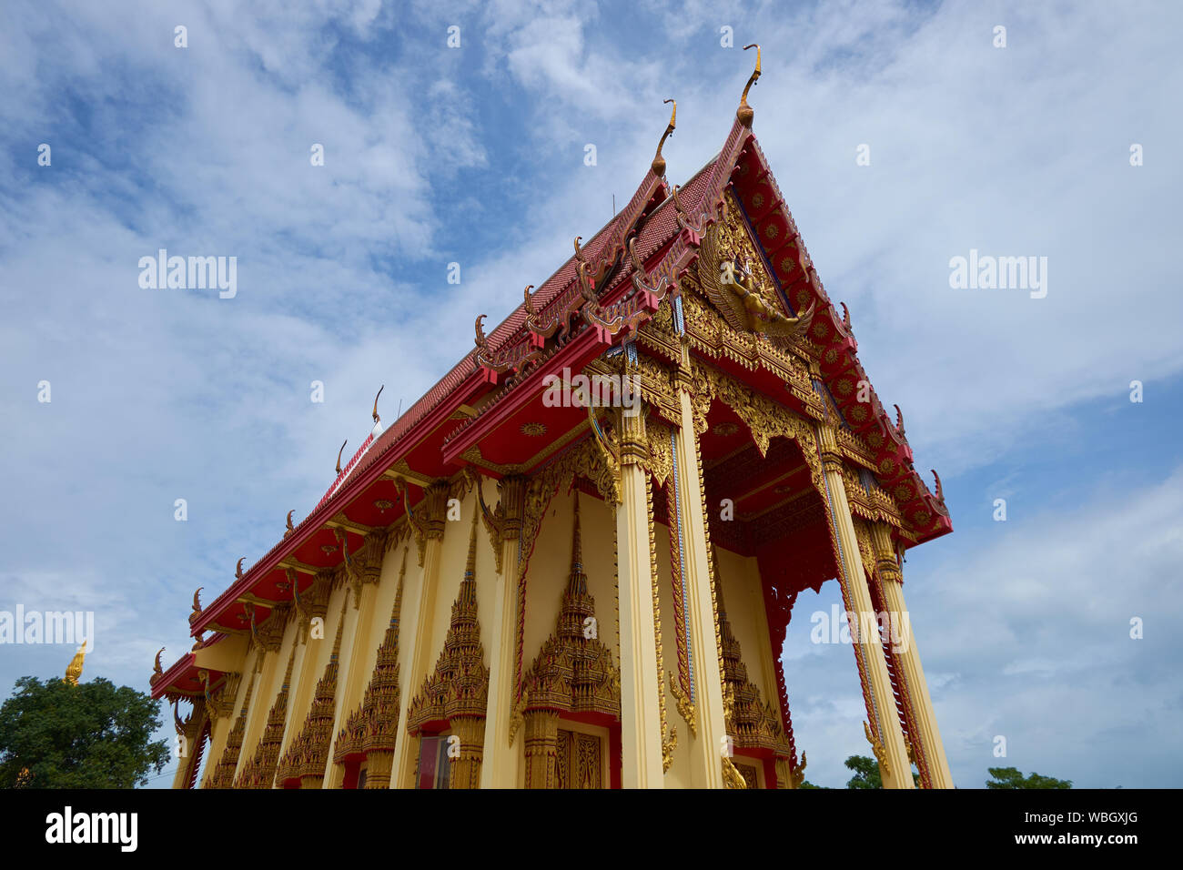 Low angle on a yellow temple at Wat Muang in Ang Thong, Thailand Stock ...
