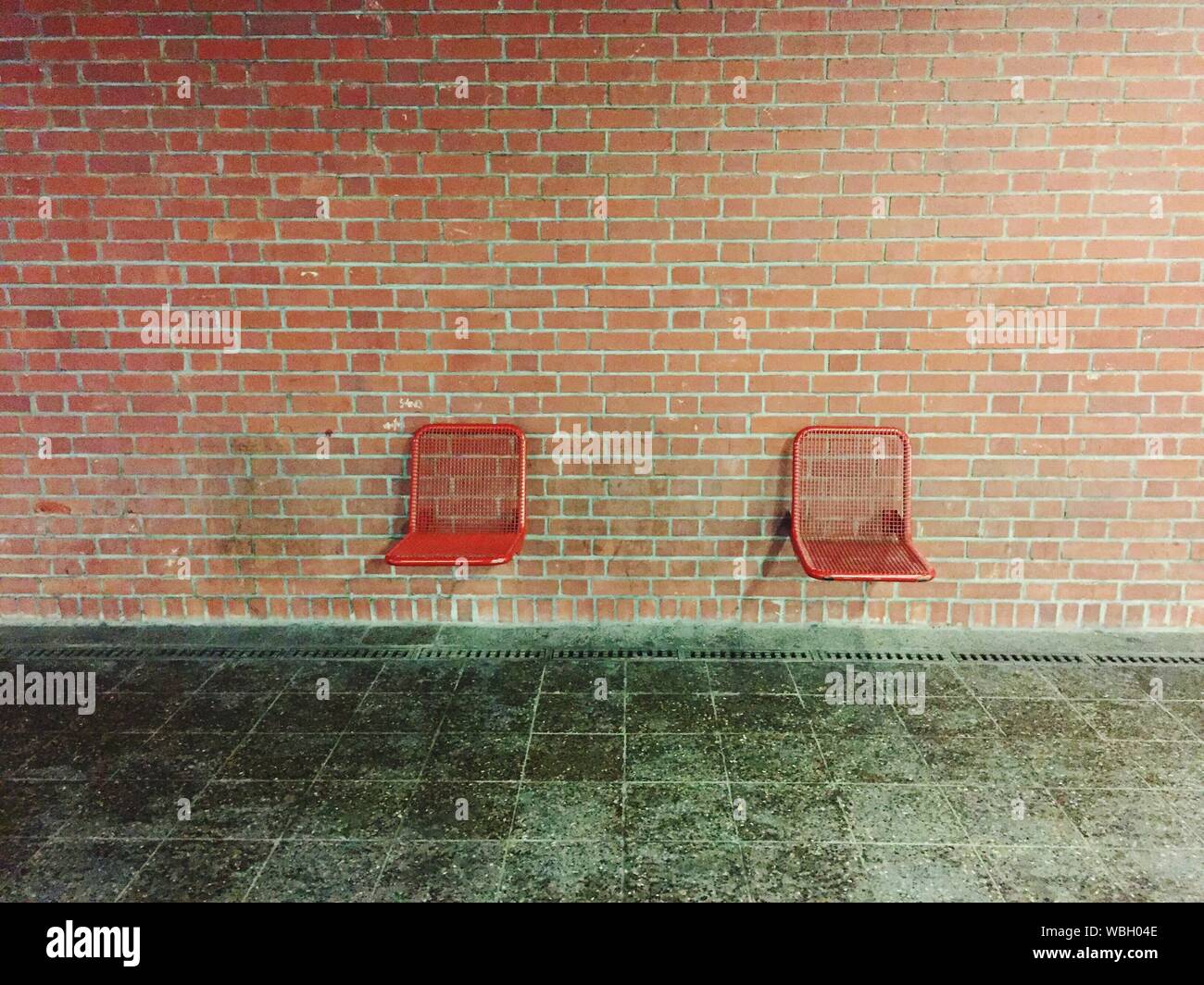 Red wall seats hi-res stock photography and images - Alamy