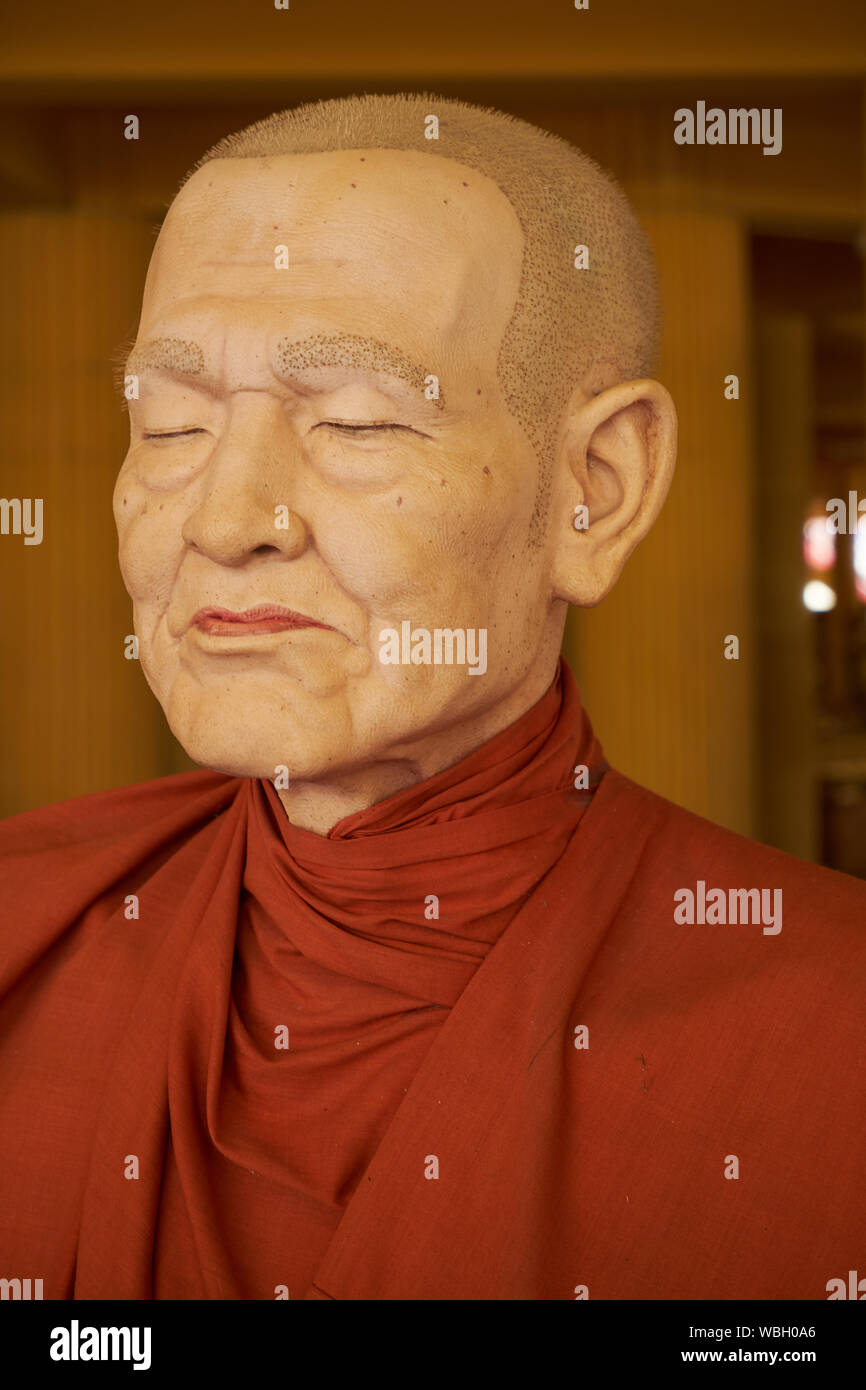 Wax monk with his eyes closed at Wat Tha Ittharam in Ang Thong ...