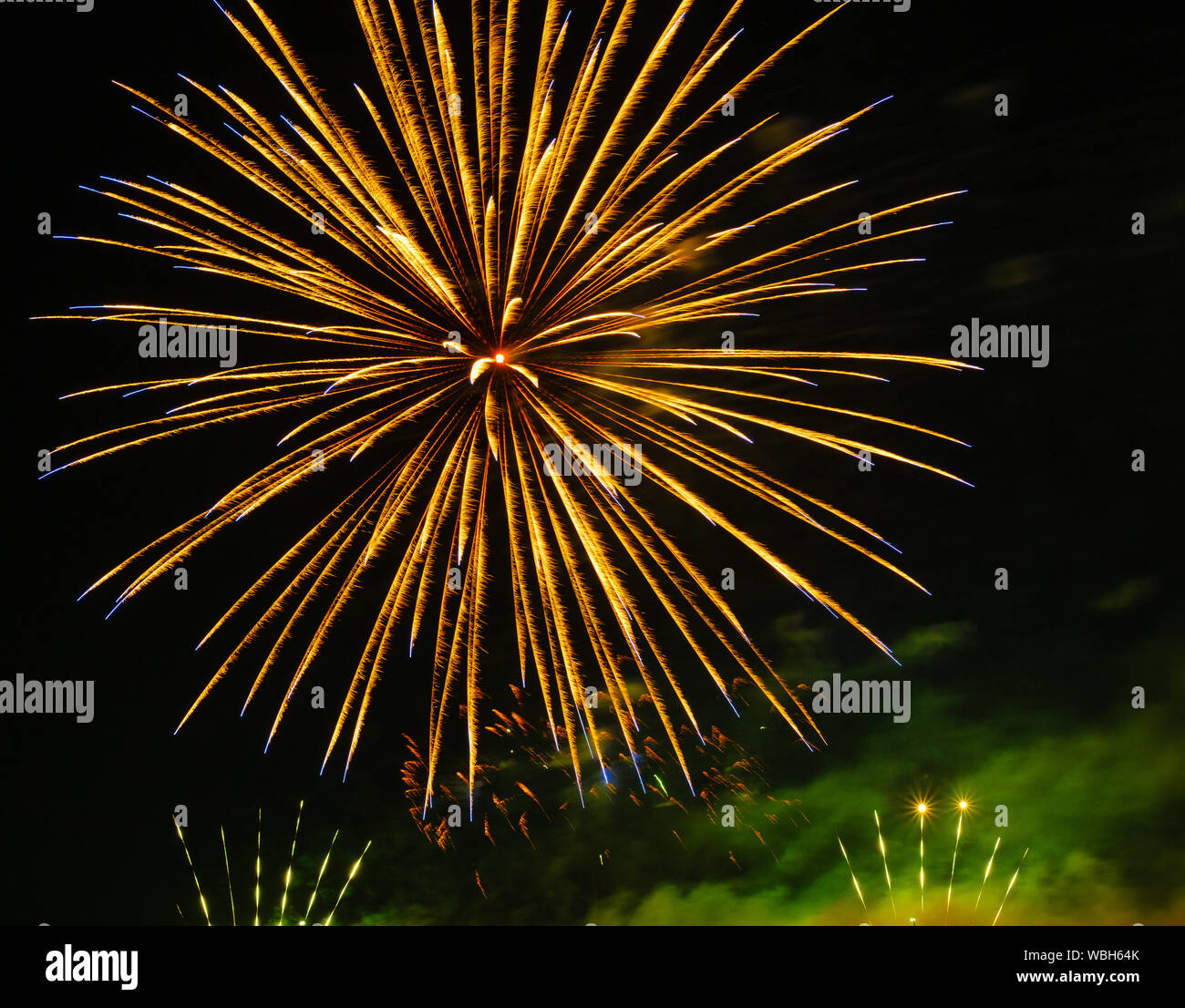 Colorful fireworks in night sky background Stock Photo - Alamy