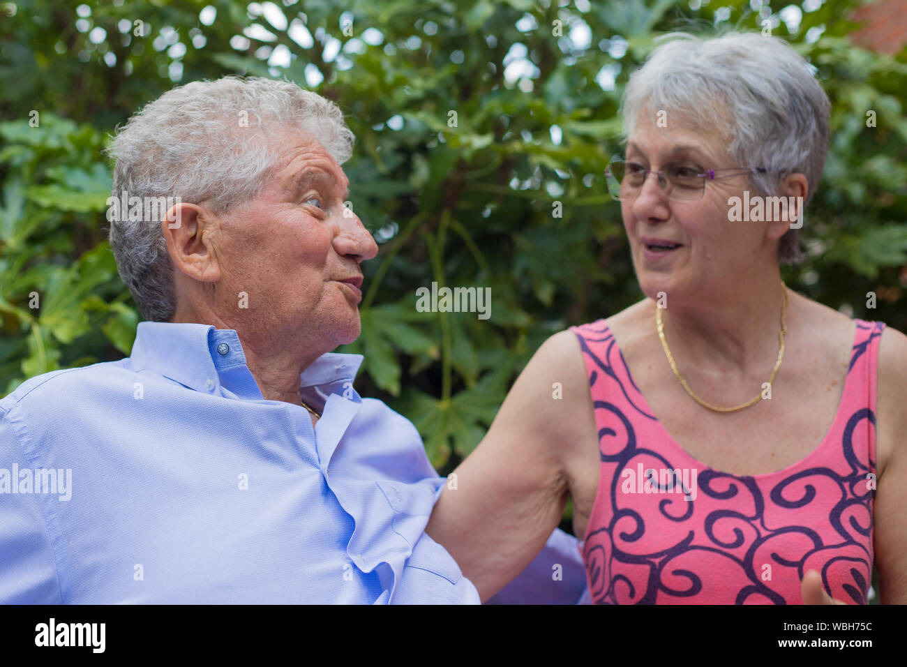 Old couple talking hi-res stock photography and images - Alamy