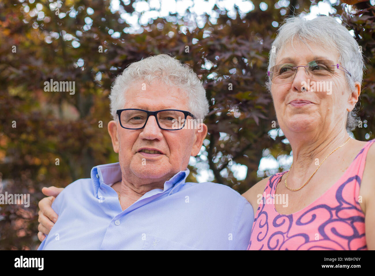 Portrait of an old couple, talking together in outdoor scenery Stock ...