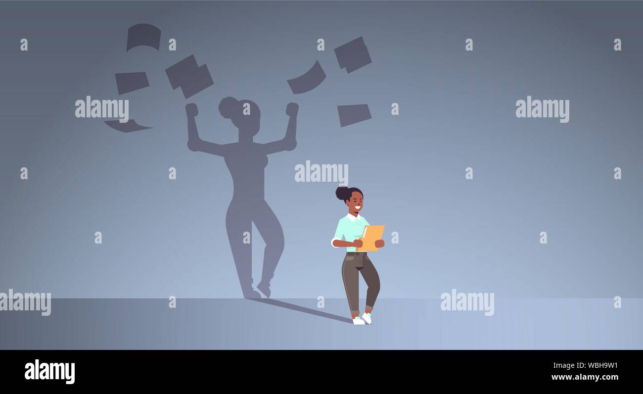 african american businesswoman holding folder shadow of business woman ...