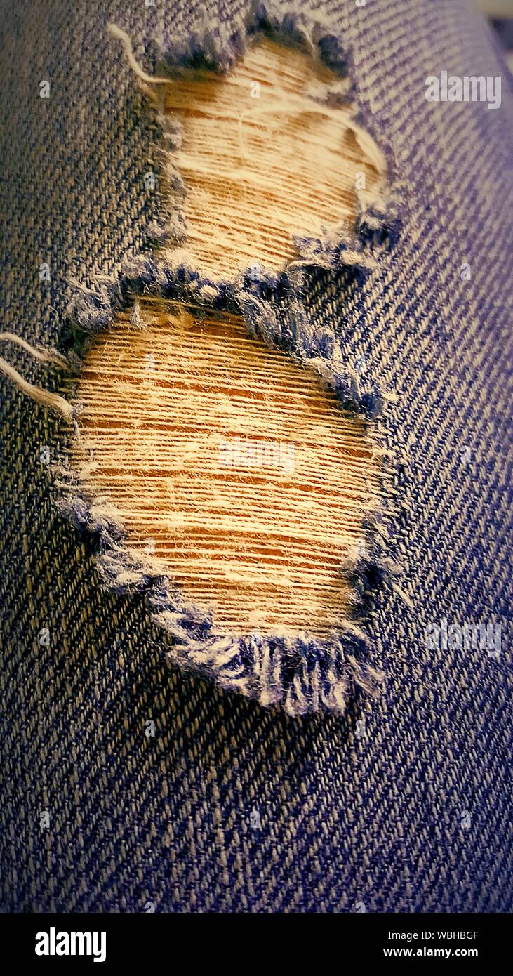 Torn thread hi-res stock photography and images - Alamy