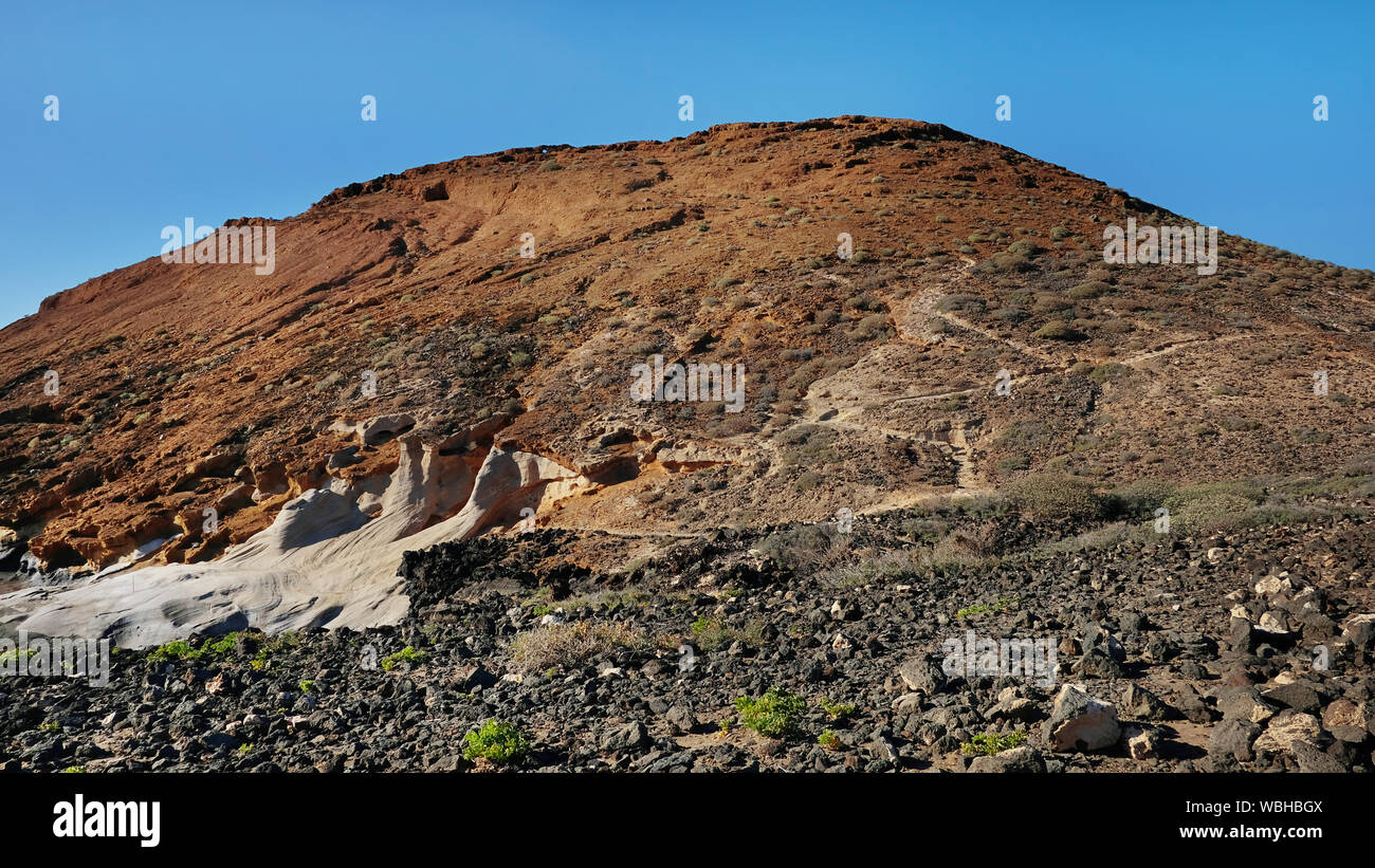 Eroded volcanic cone known as Montana Amarilla, popular hiking ...