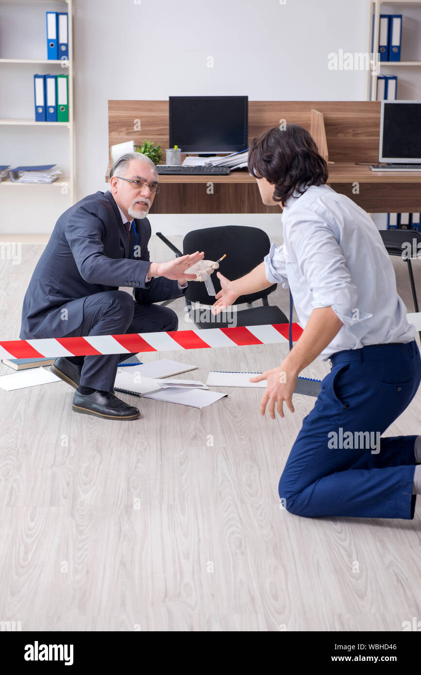Forensic investigator investigating theft hi-res stock photography and ...