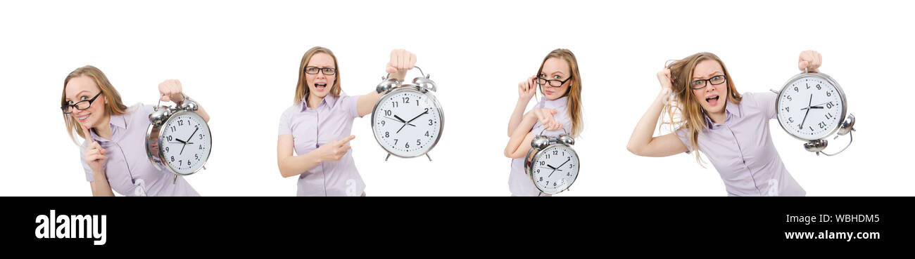 The young employee holding alarm clock isolated on white Stock Photo ...